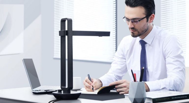Aura can scan documents, photos and books and doubles as a desk lamp ...
