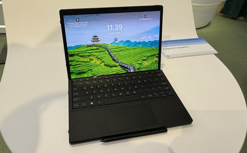 We take a hands-on look at the HP Spectre Foldable PC and the HP Envy ...